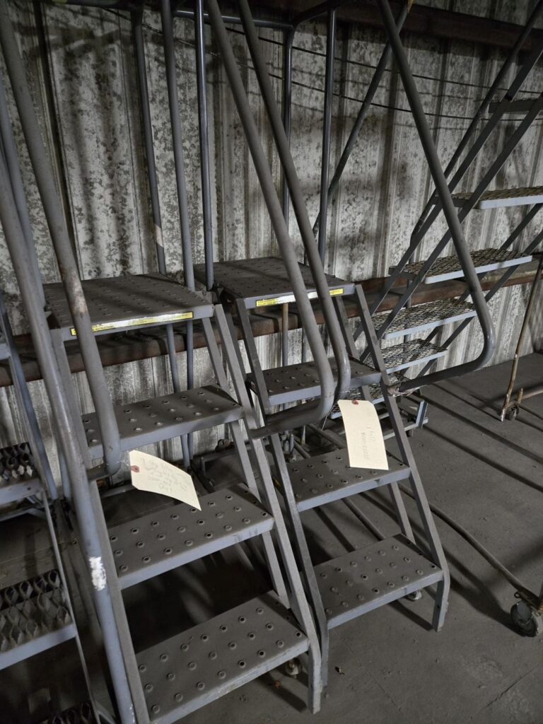 4 Step Rolling Ladder - Used - Mid Florida Material Handling